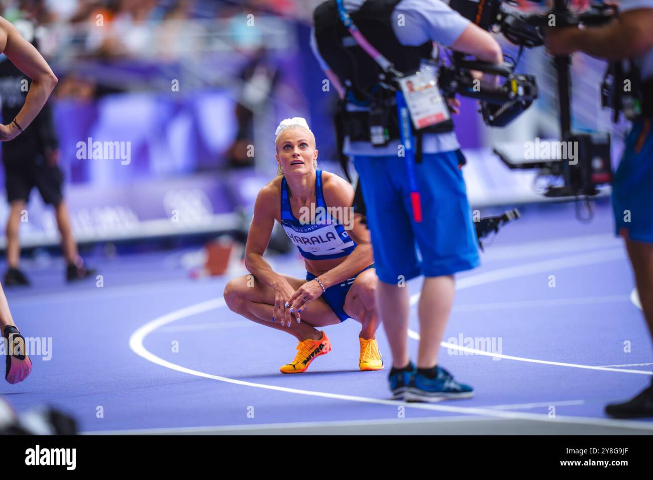 Lotta Harala participating in the 100 meters hurdles at the Paris 2024 ...