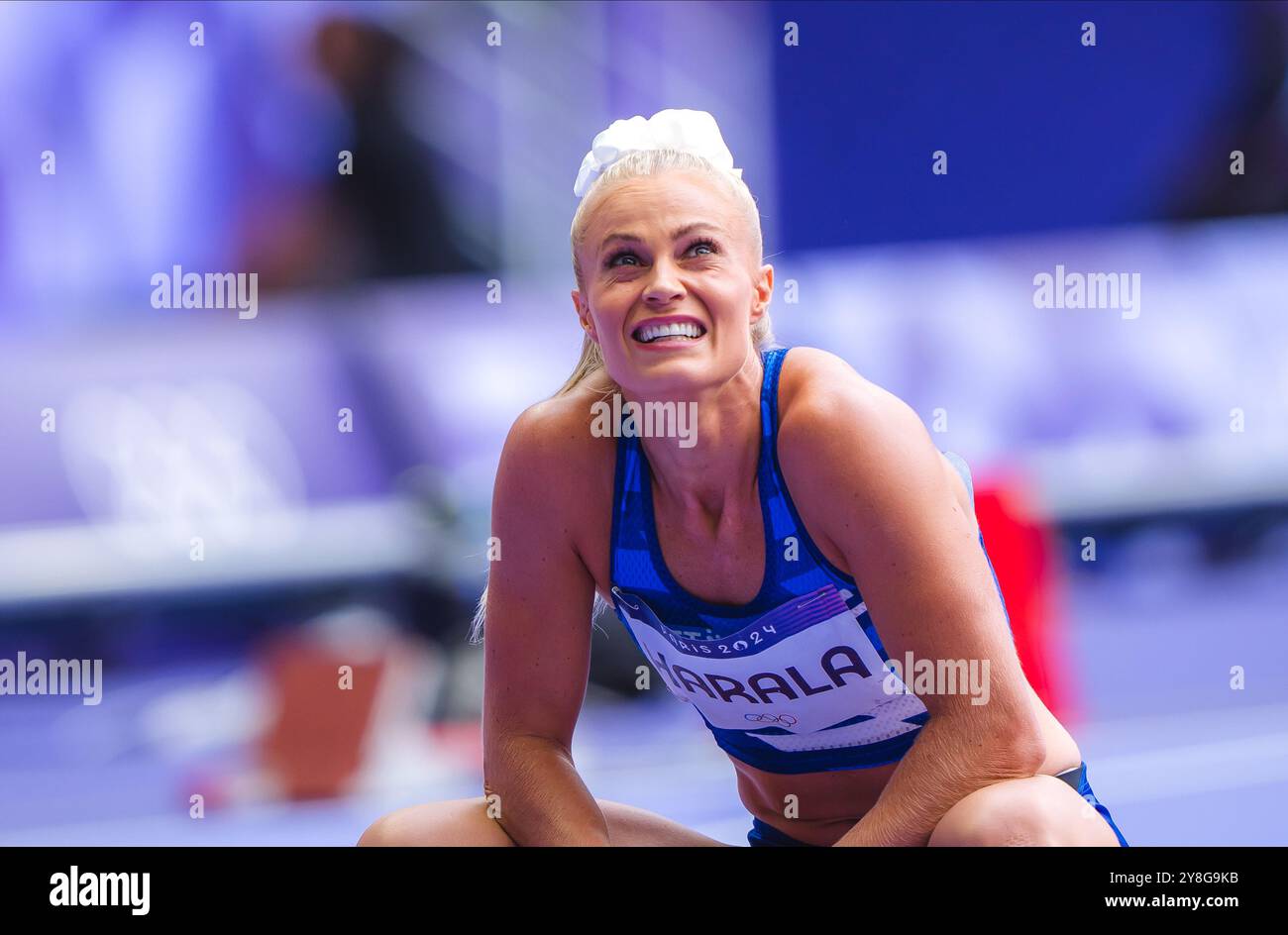 Lotta Harala participating in the 100 meters hurdles at the Paris 2024 ...