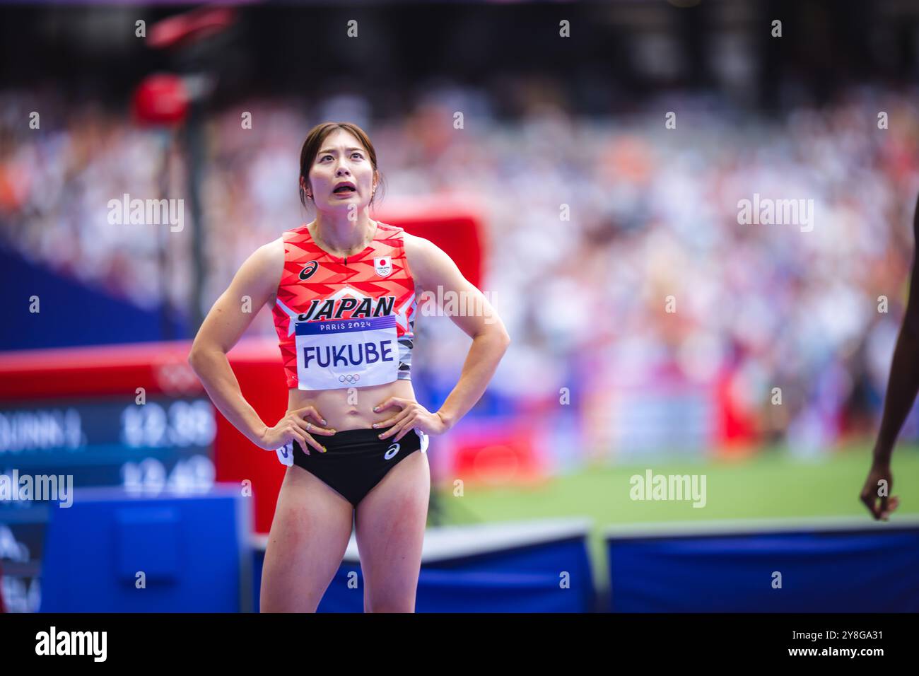 Mako Fukube participating in the 100 meters hurdles at the Paris 2024 ...