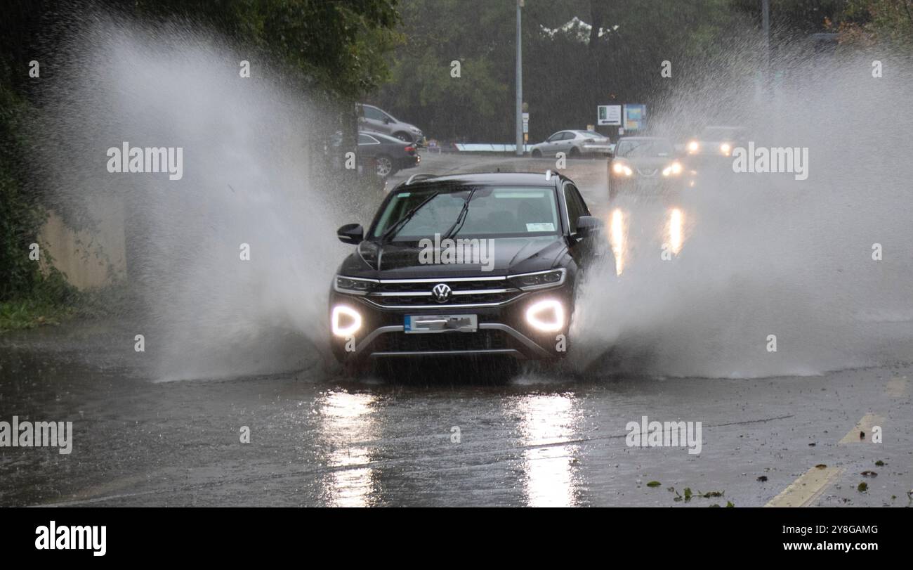 Car driving through flooded roads after a winter storm Stock Photo - Alamy