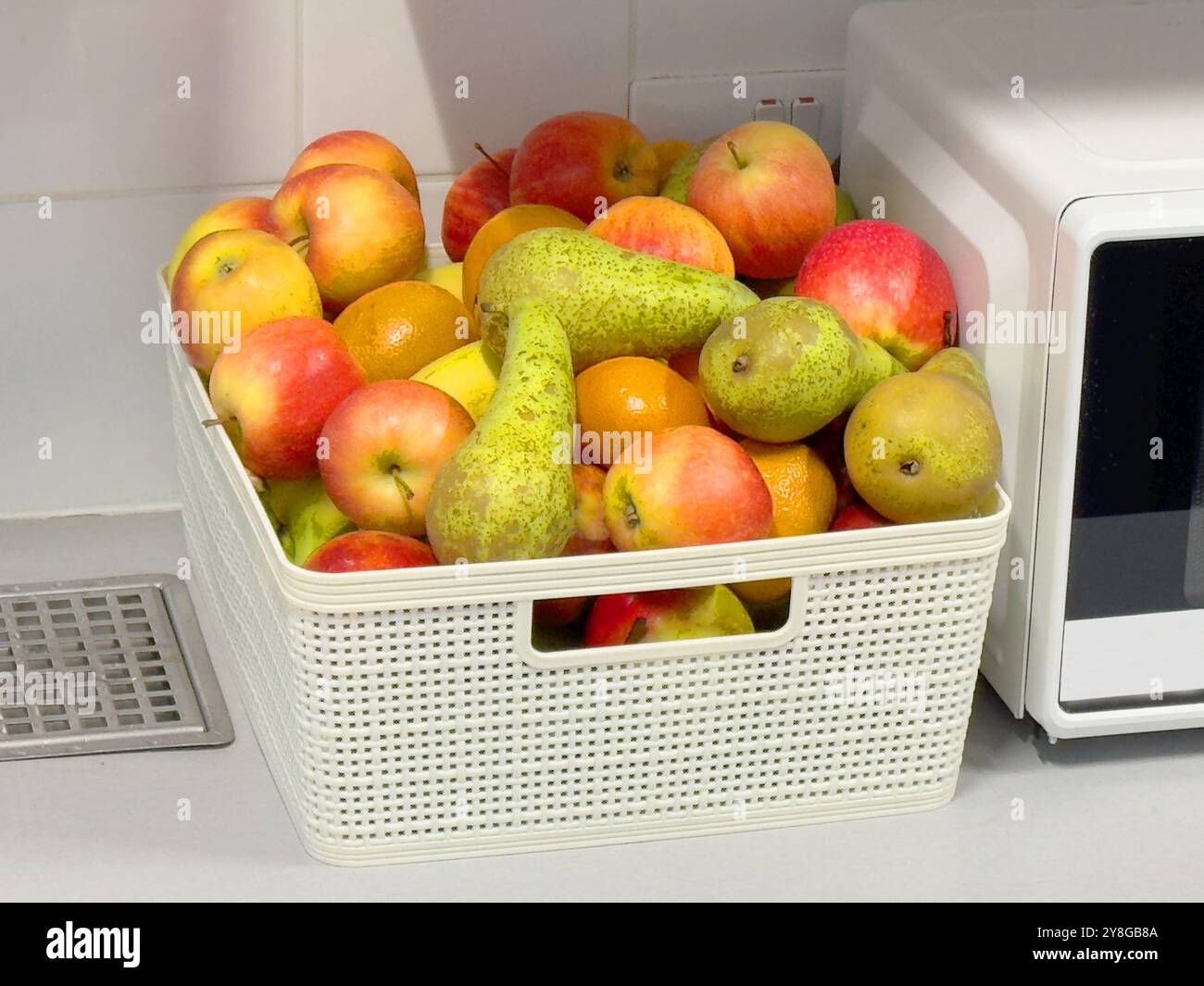 Fresh fruit at workplace to promote healthy eating Stock Photo - Alamy
