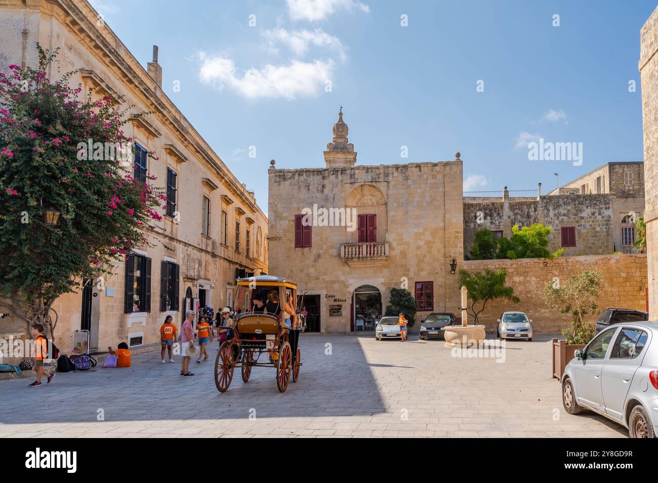 MDINA, MALTA - SEPTEMBER 02, 2024: Visitors explore Mdina in a horse ...