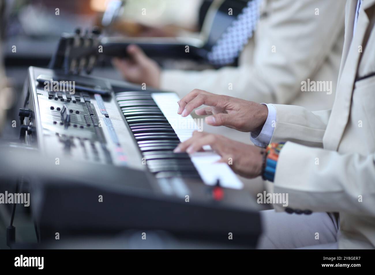 An asian people playing the piano Stock Photo - Alamy