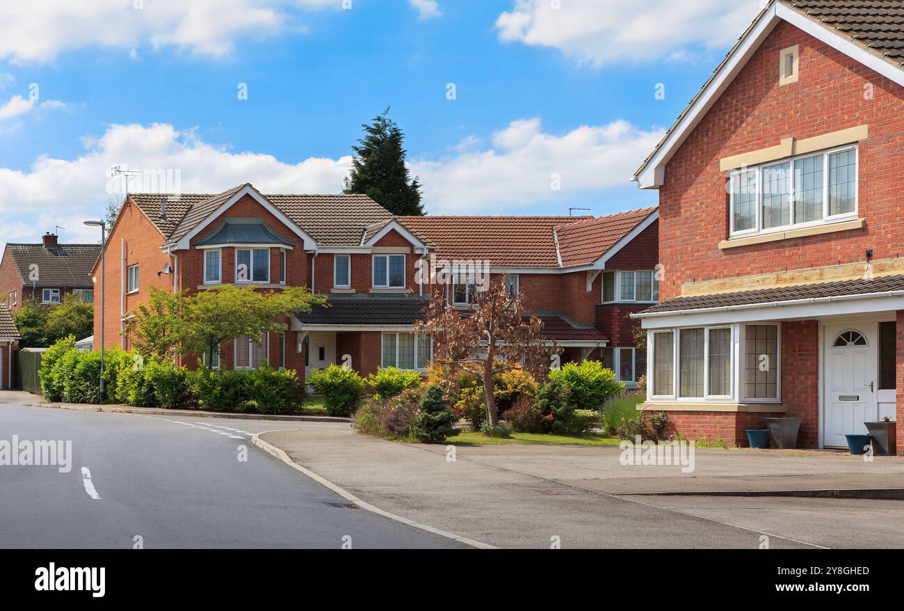 New and modern english houses typical english street Stock Photo - Alamy