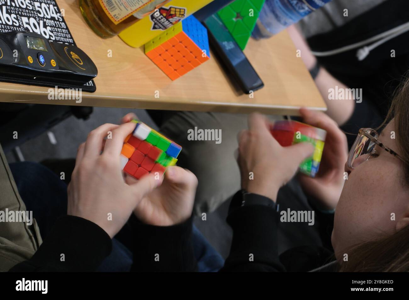 Leipzig, Germany. 05th Oct, 2024. Participants in a "Rubik's cube" competition during training ...