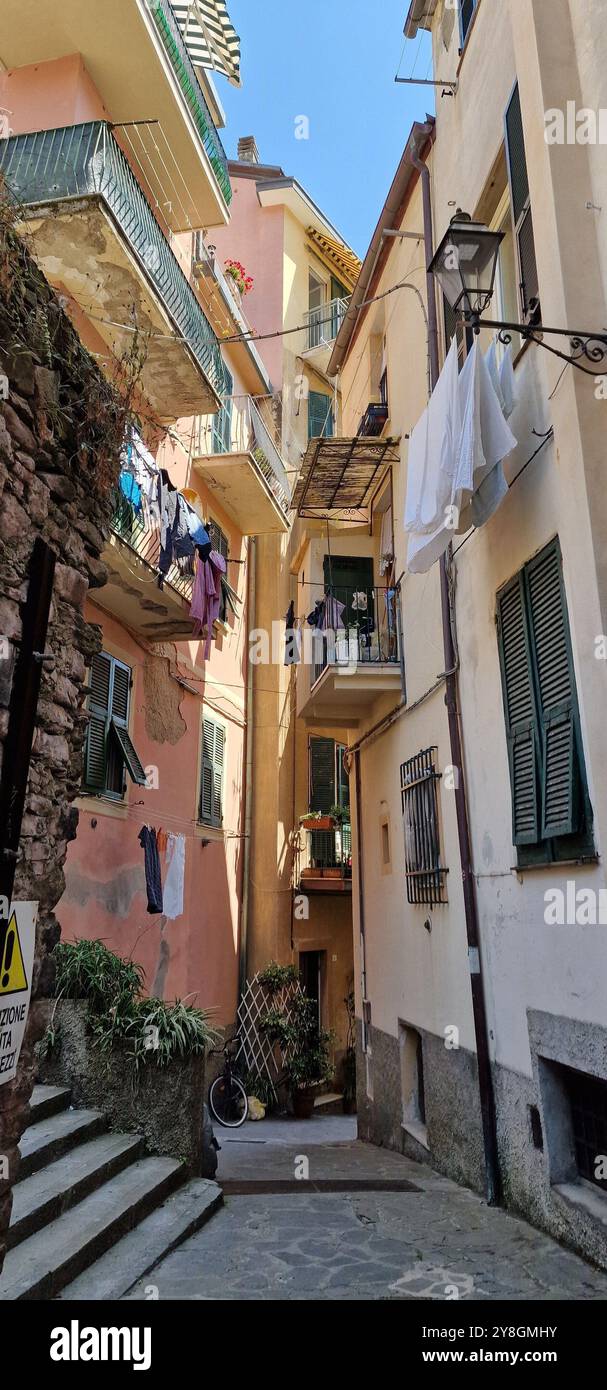 Idyllic view of a typical narrow italian street in the historic town of ...
