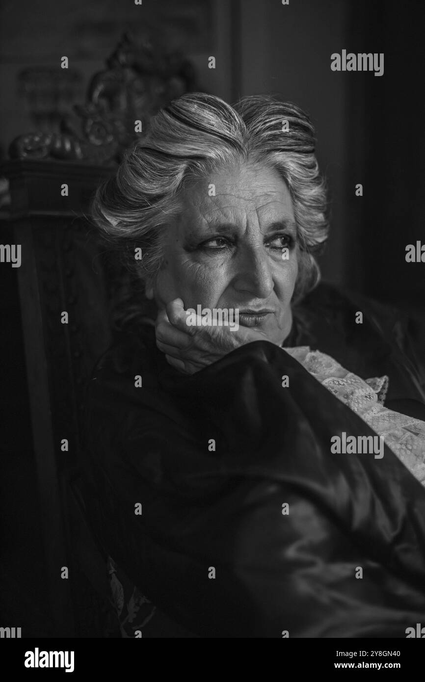 Senior woman posing on Black and White Stock Photos & Images - Alamy