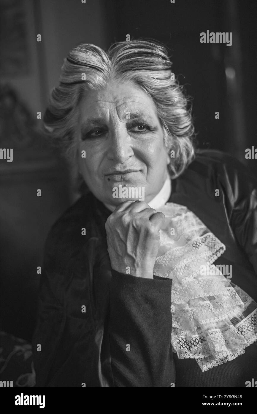 Thoughtful senior female judge in a courtroom, considering a legal case ...