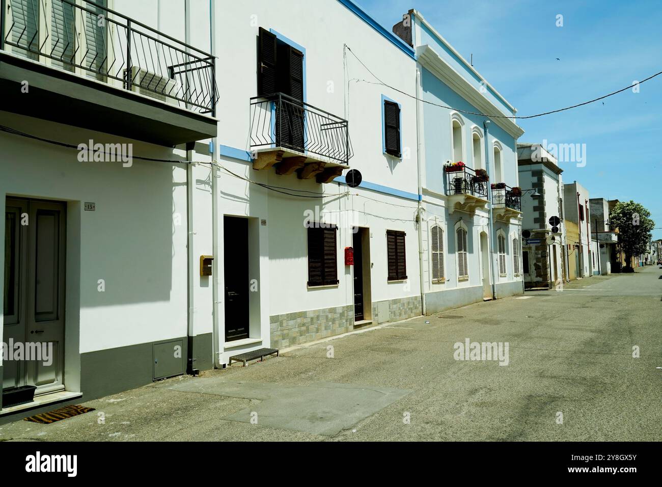 The seaside village and the white houses of Calasetta in the island of ...