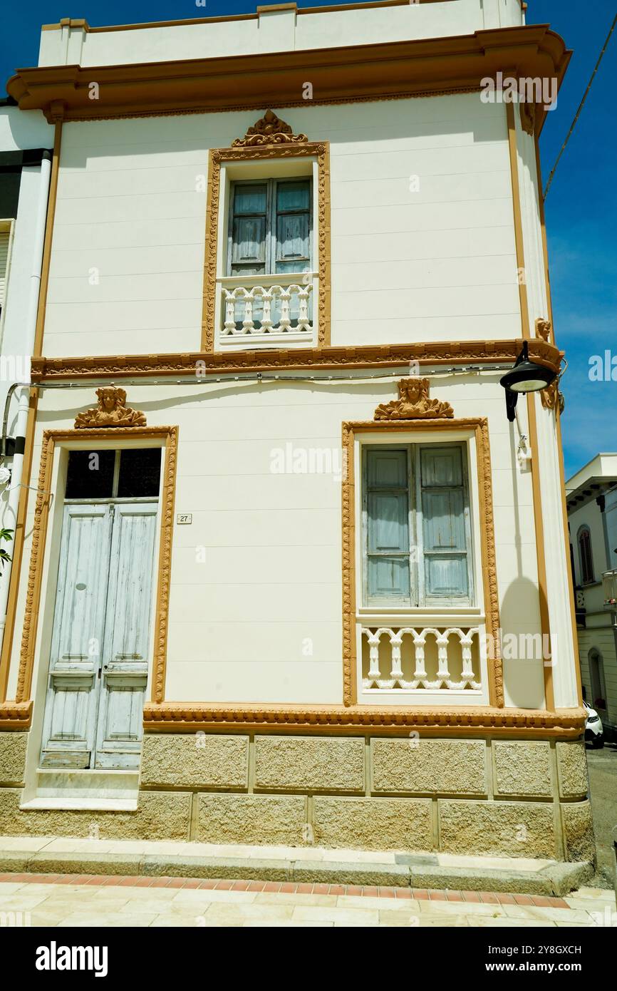 The seaside village and the white houses of Calasetta in the island of ...