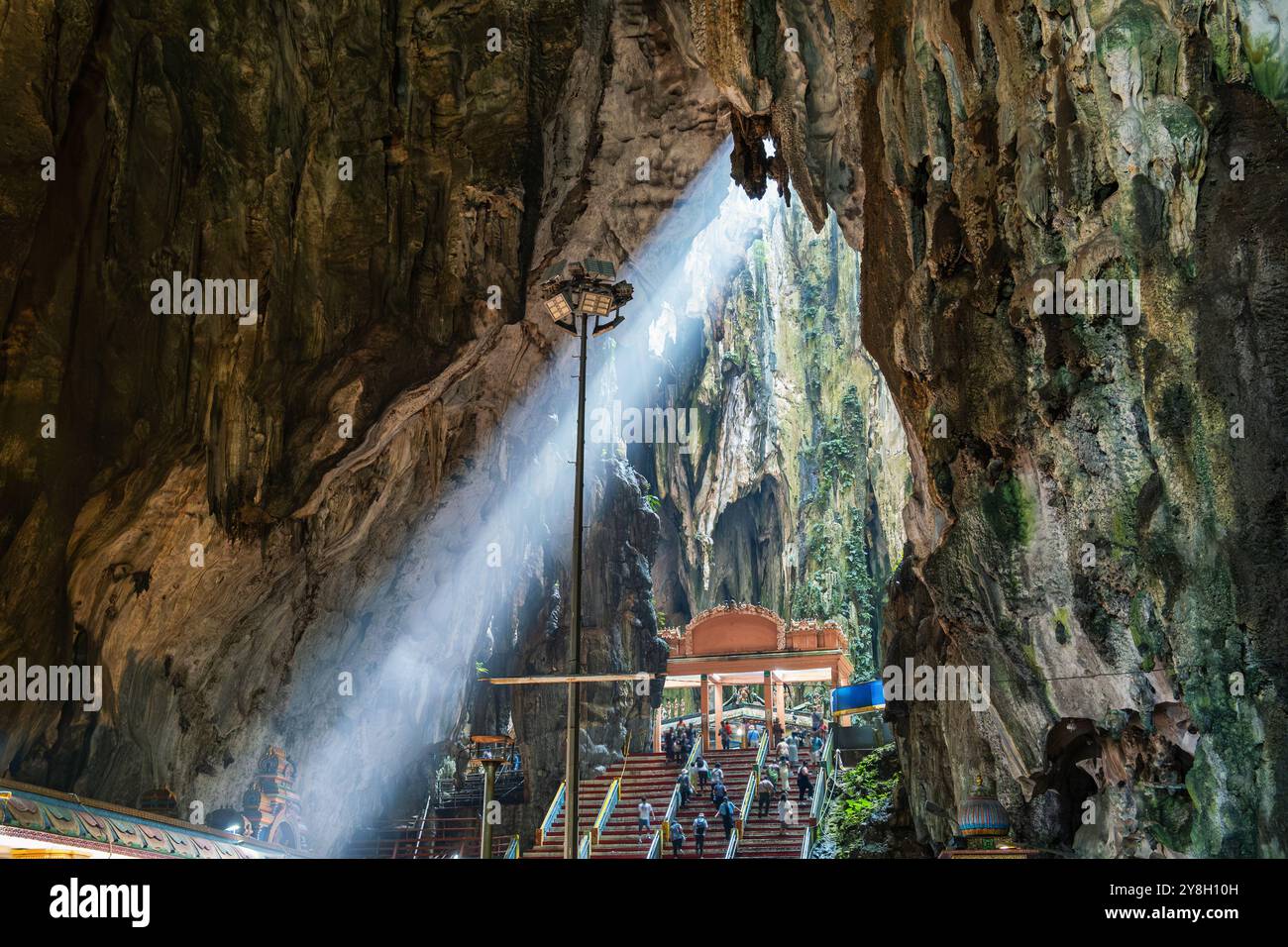 Batu Caves interior, Selangor, Malaysia. Tourists visiting Batu cave ...