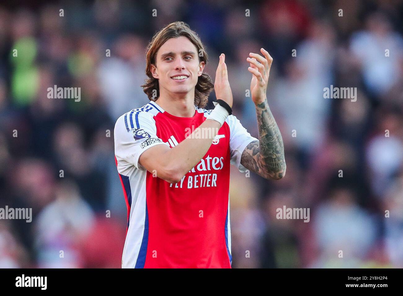 Riccardo Calafiori of Arsenal acknowledges the fans after the teams ...