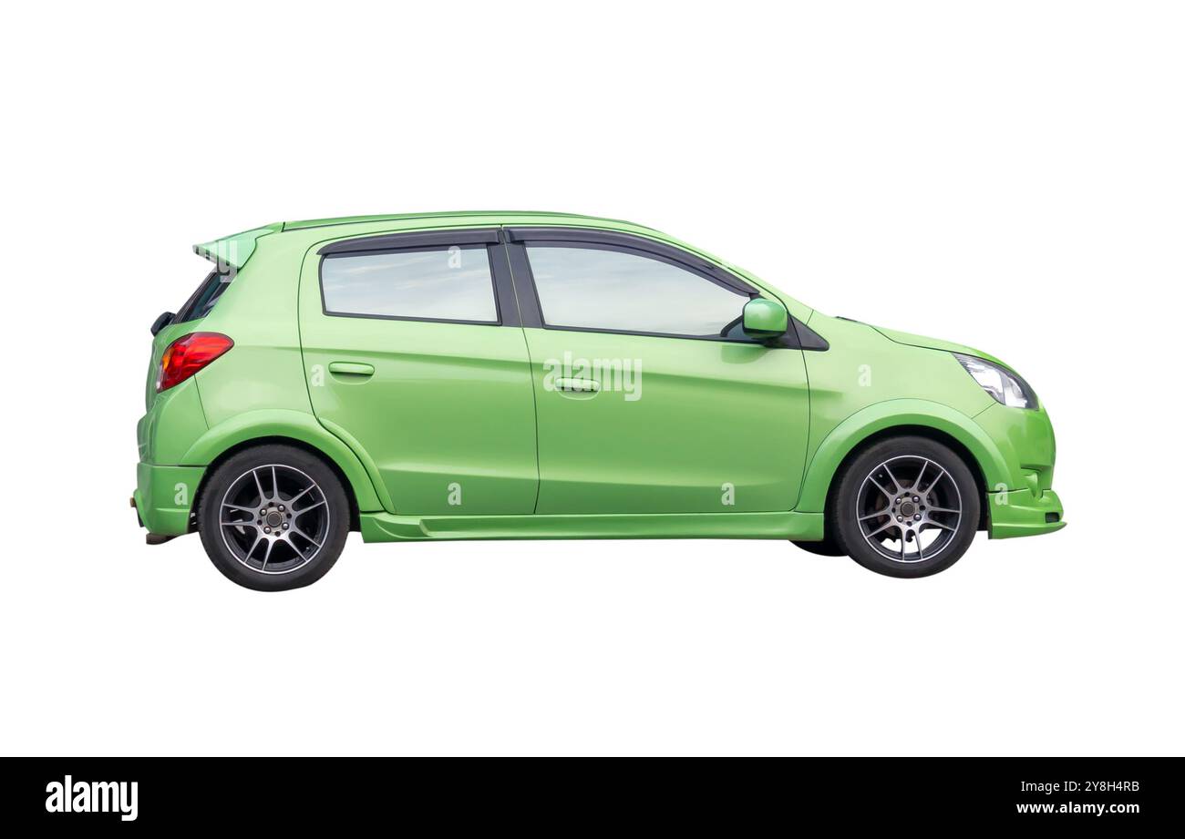 Side view of green hatchback sports car is isolated on white background ...