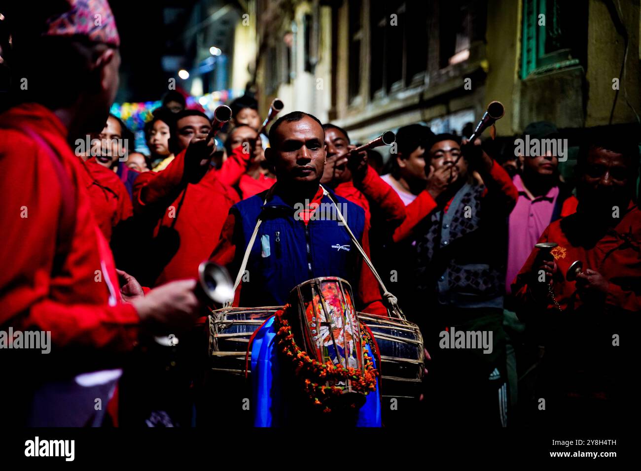 A devotees play a traditional instruments during the Astamatrika Naach ...