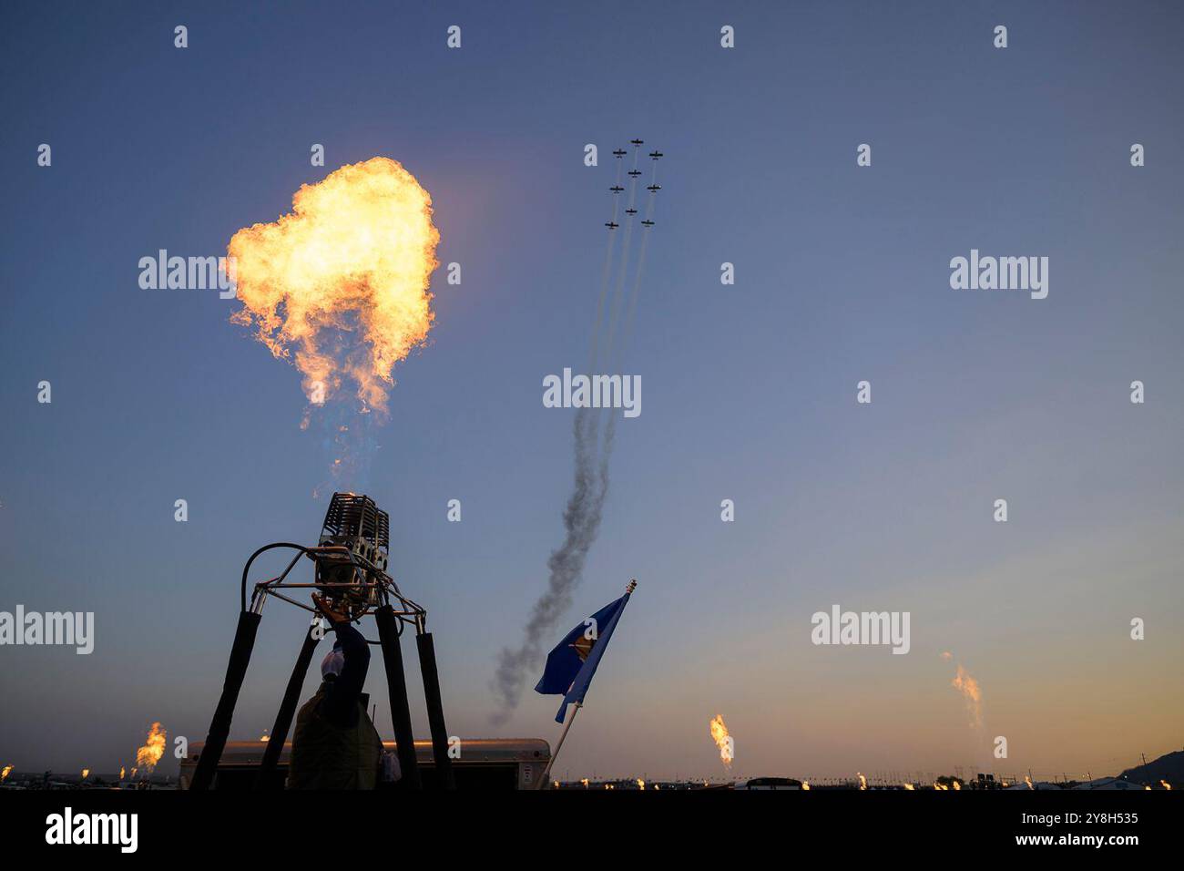 A fly-over by The Chili Flight Team, and a candlelight burn by balloon ...