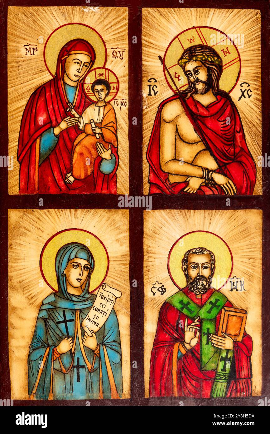 Colorful religious icon featuring four panels, each depicting a ...