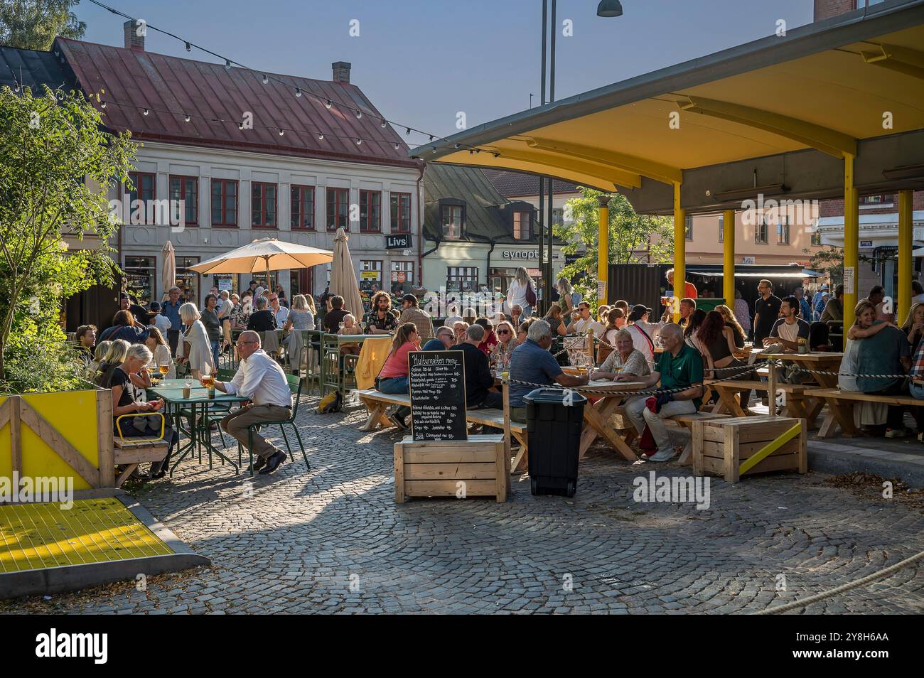 people sitting on Boutulfsplatsen in Lund during Culture Night 2024 ...