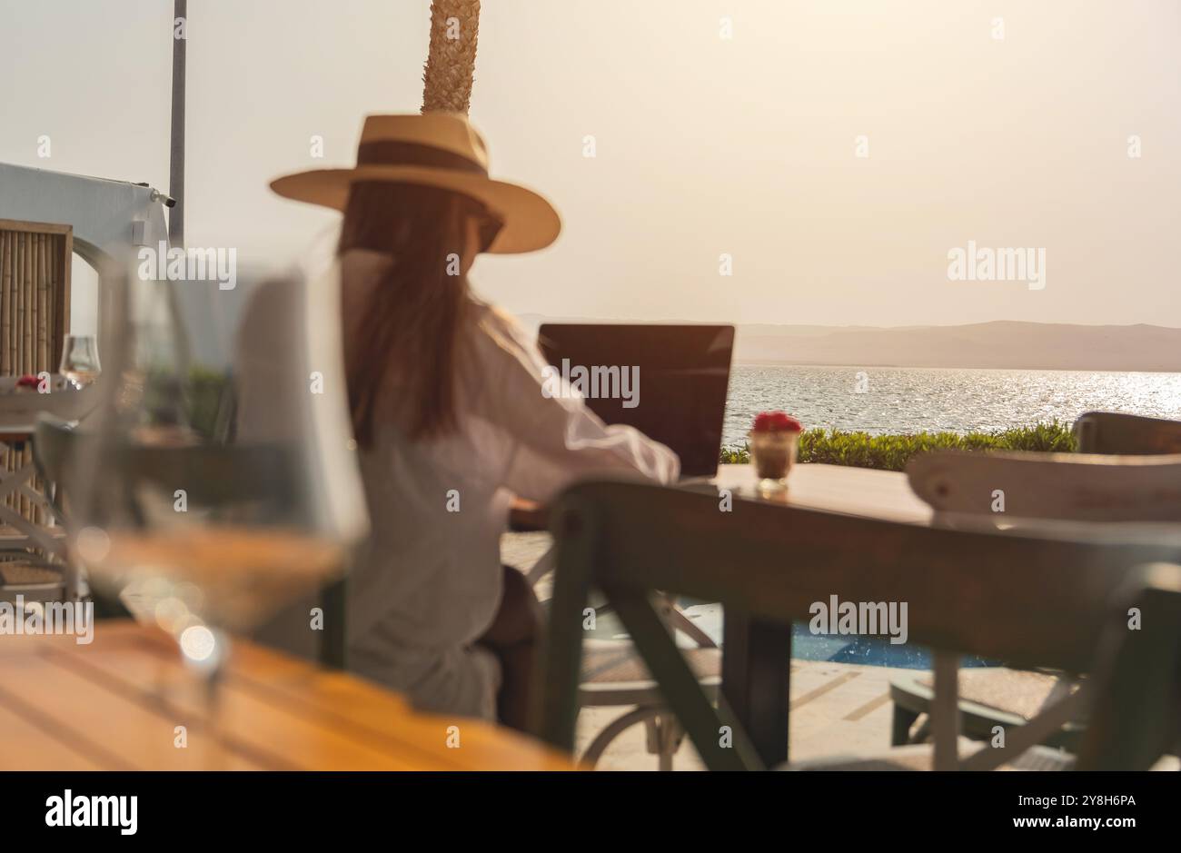 Beautiful Young Woman Working on Laptop Computer Outdoors In Summer ...