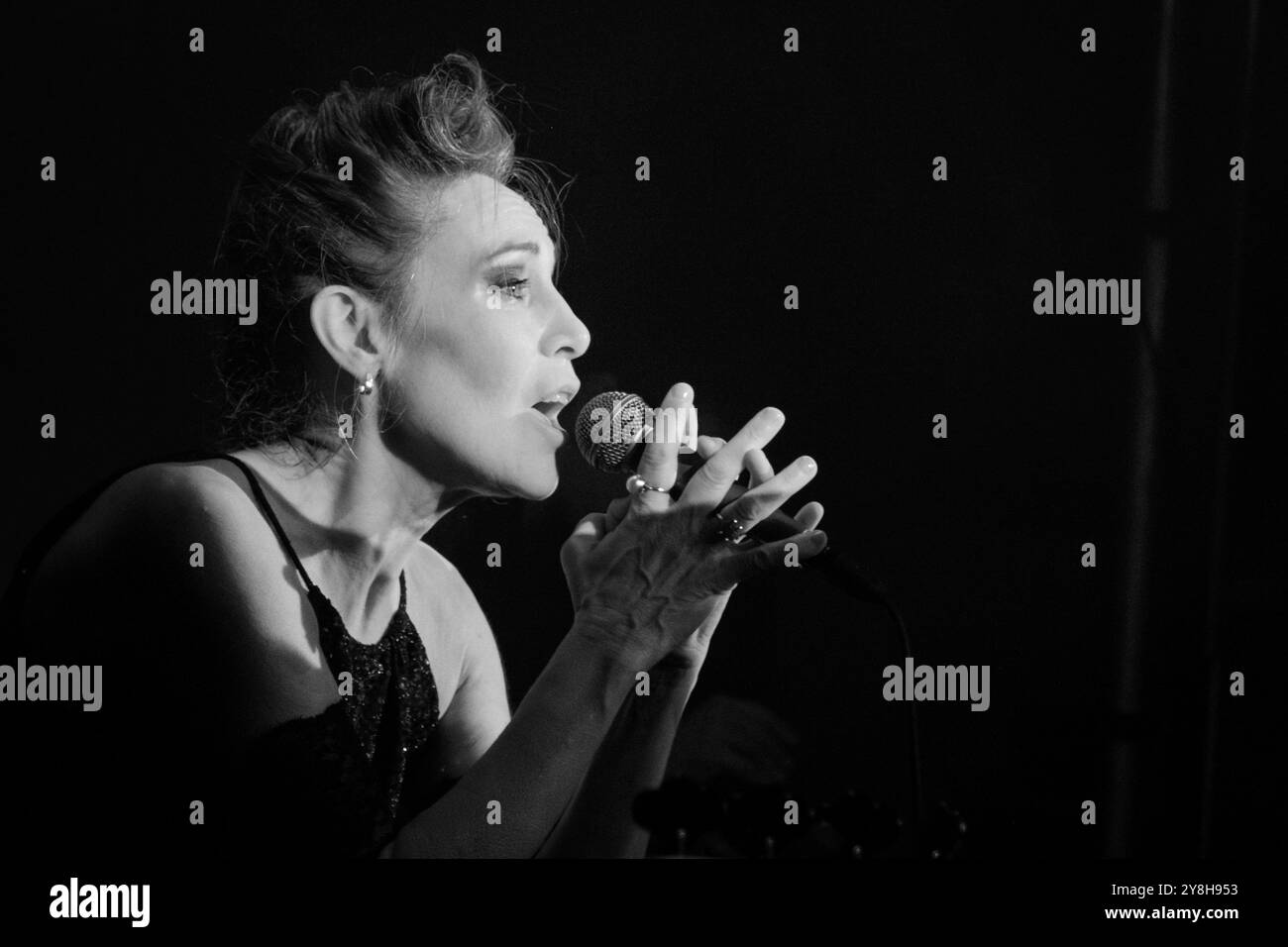 A close up black & white picture of Mona Soyoc, lead singer of Kas ...