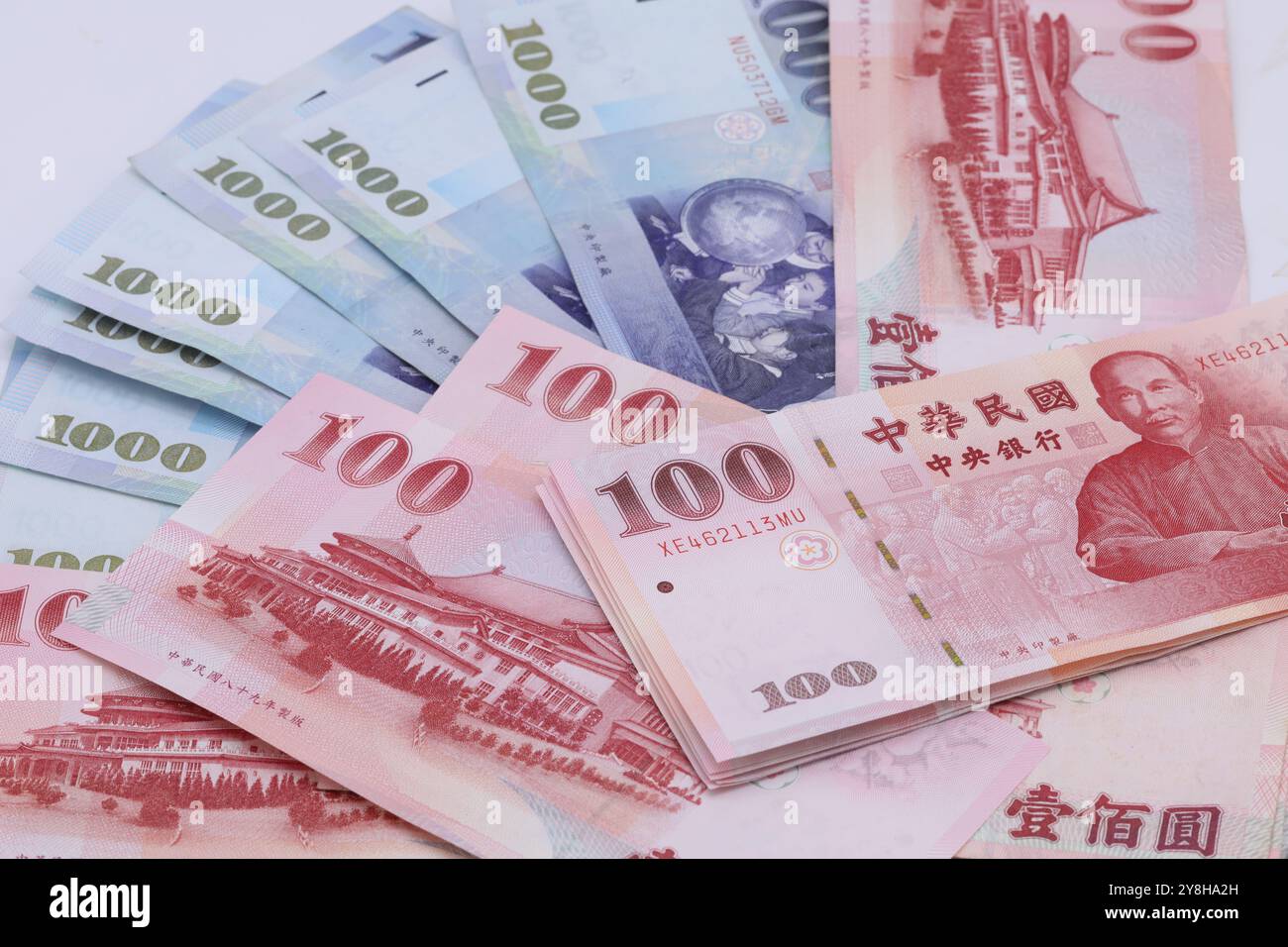 Taiwan dollar banknotes background Stock Photo - Alamy