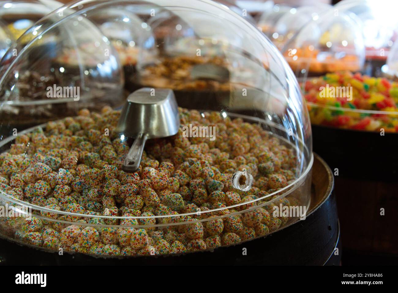 Colorful Assortment of Candies in Glass Bowls at a Candy Store Stock ...