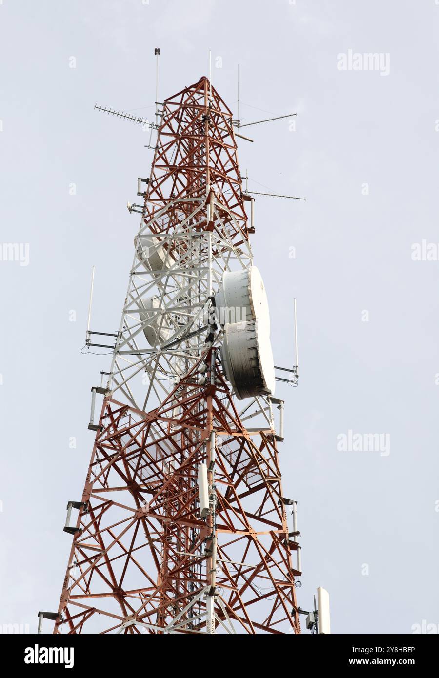 Telecommunication tower with clear sky background Stock Photo - Alamy