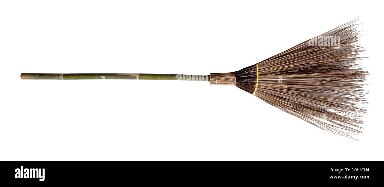 Coconut stick broom isolated on white background Stock Photo - Alamy