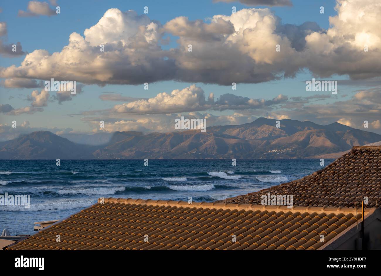 Structure of an orange roof. Ionic sea with waves during a stormy day ...