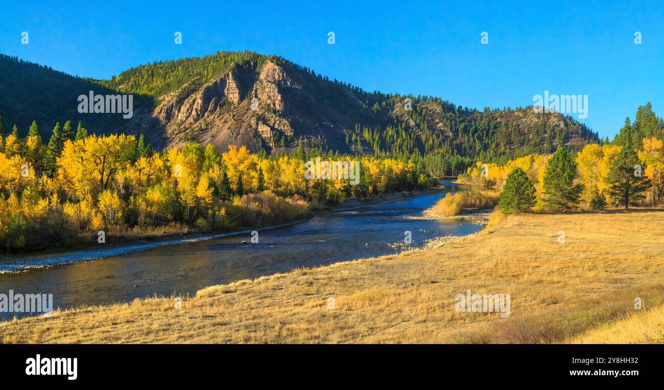 panorama of fall colors and cliffs along the blackfoot river near ...