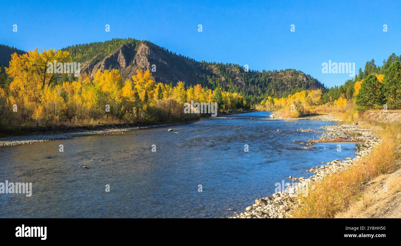 panorama of fall colors and cliffs along the blackfoot river near ...