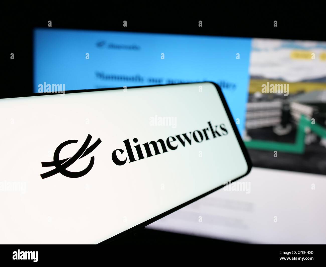 Mobile phone with logo of Swiss direct air capture company Climeworks ...