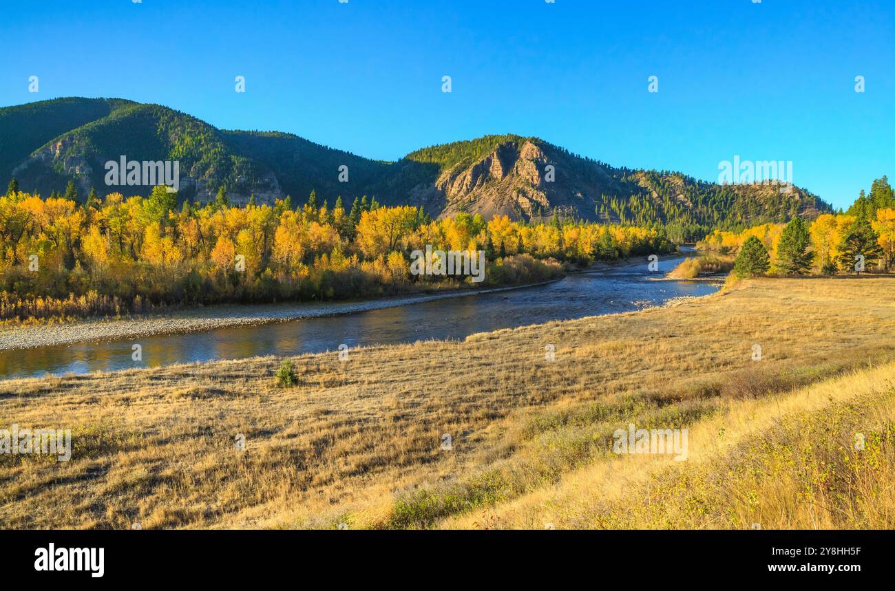 fall colors and cliffs along the blackfoot river near ovando, montana ...