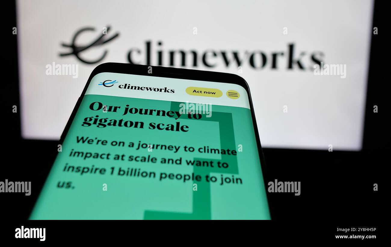 Smartphone with website of Swiss direct air capture company Climeworks ...