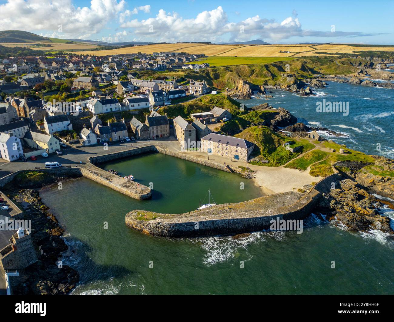 Aerial view from drone of Portsoy village and harbour on Moray coast in ...