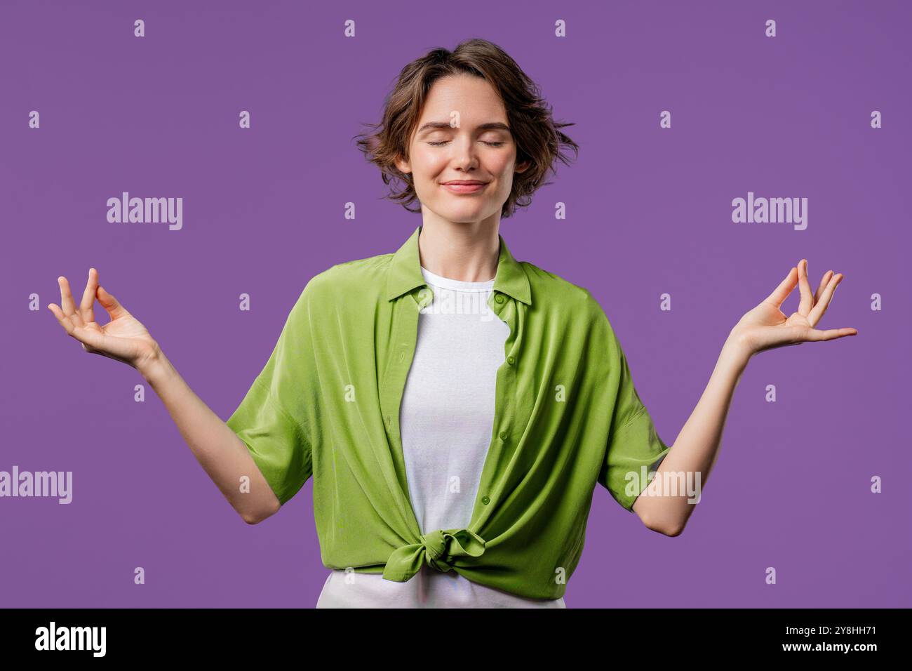 Tranquil Woman relaxing, meditating, refuses stress. Lady breathes ...