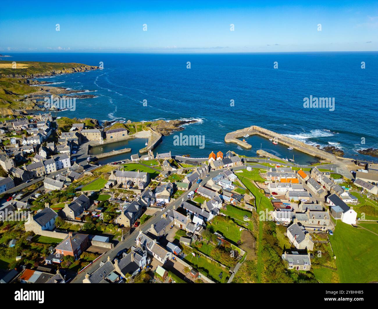 Aerial view from drone of Portsoy village and harbour on Moray coast in ...
