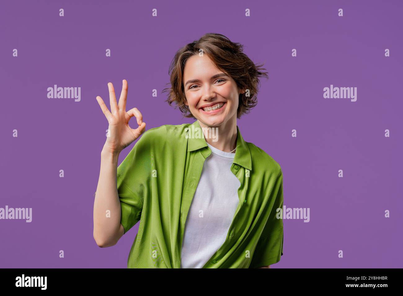 Pretty woman makes hand sign okay, ok gesture. Happy girl, correct ...