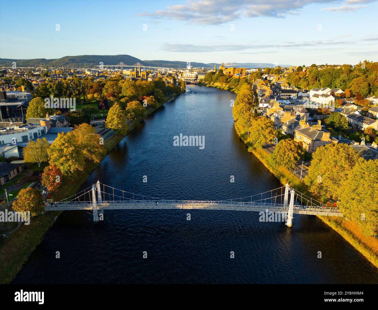 Aerial view from drone of suspension footbridge over River Ness in city ...