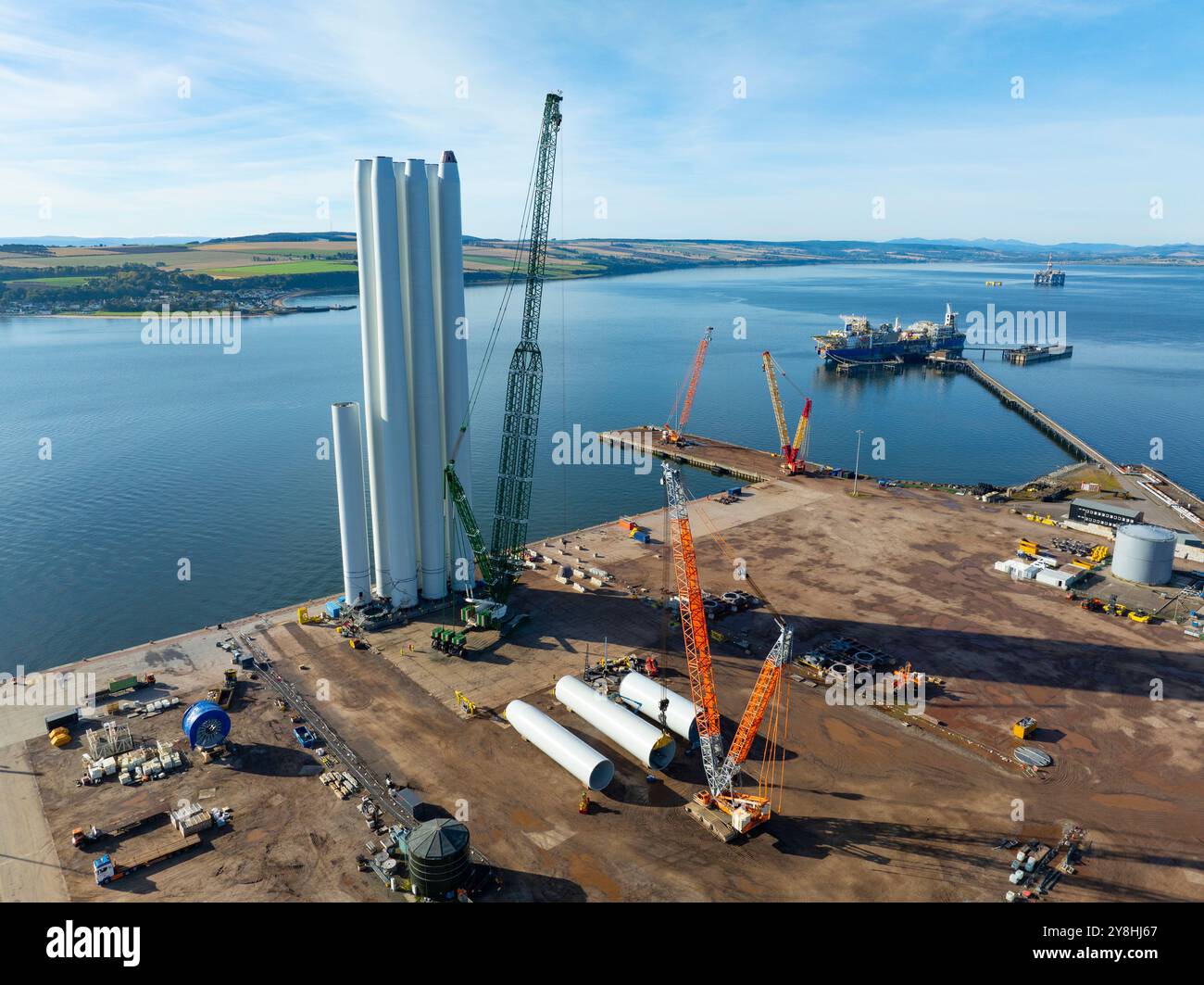 Aerial view from drone of offshore wind turbine towers being erected at ...