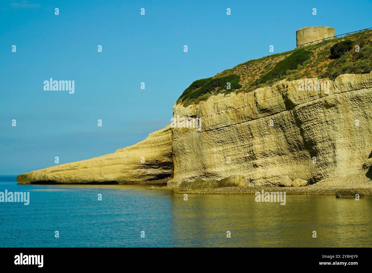 The beach and cliffs of Santa Caterina di Pittinuri in the Sinis ...