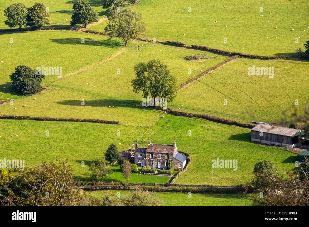 Farmhouse and farm nestled in the Cheshire countryside landscape at ...