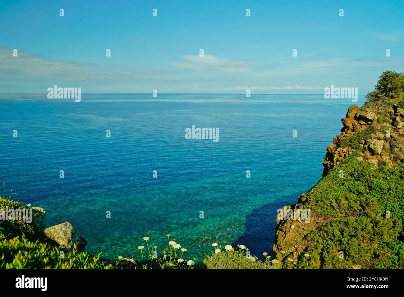 The beach and cliffs of Santa Caterina di Pittinuri in the Sinis ...