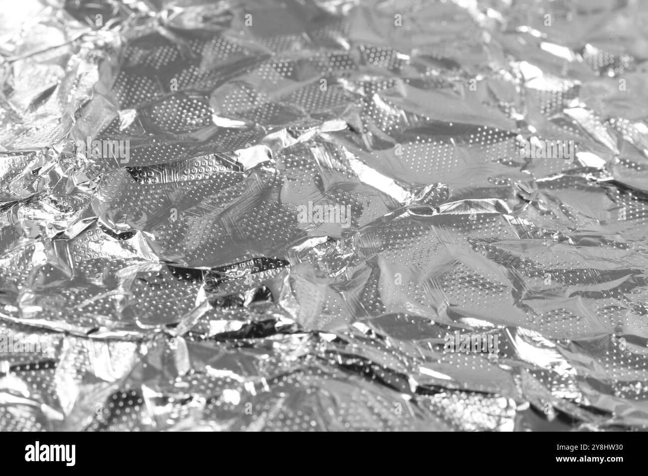 Shiny silver tinfoil surface as background, closeup Stock Photo - Alamy