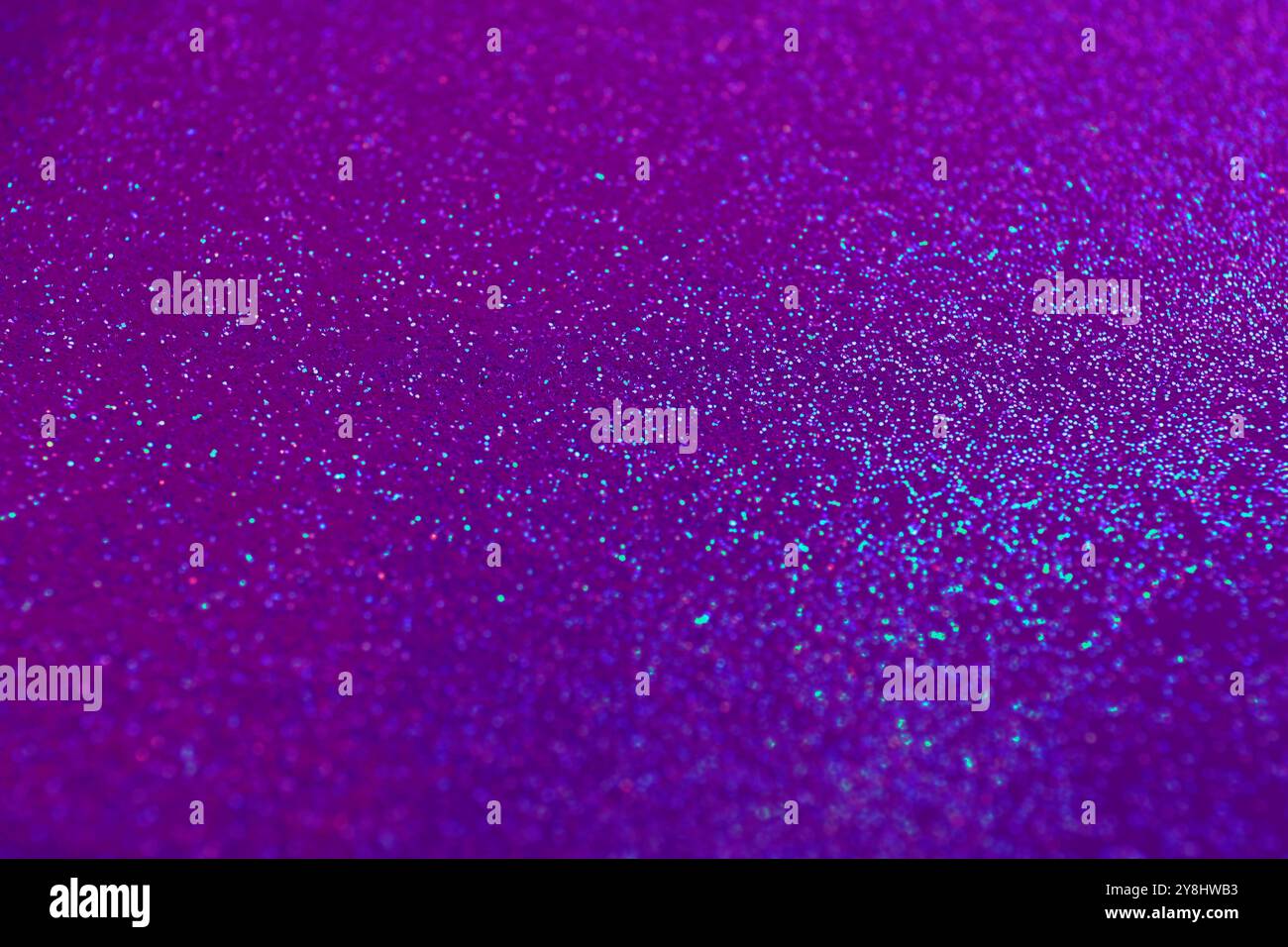Shiny violet and blue glitter, closeup. Halloween background, bokeh ...