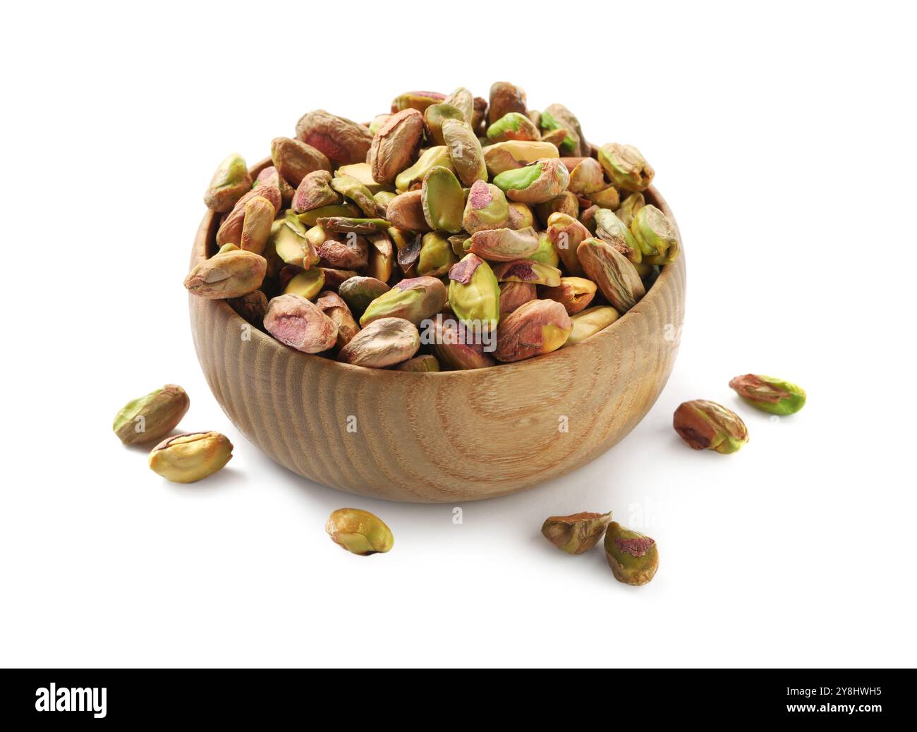 Peeled pistachio nuts in bowl isolated on white Stock Photo - Alamy