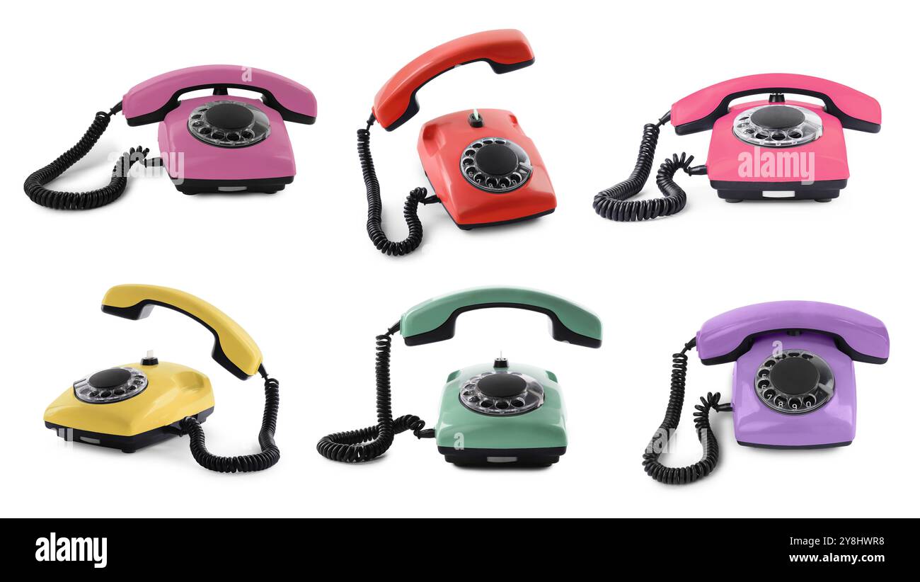 Old telephone with rotary dial of different colors isolated on white ...