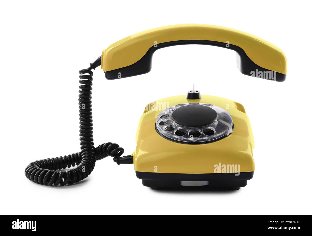 Old yellow telephone with rotary dial isolated on white Stock Photo - Alamy