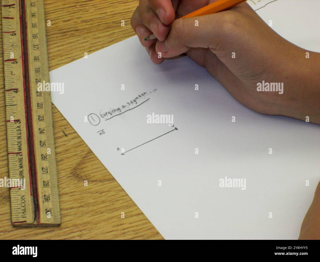 Elementary work by students learning geomery and how to use a ruler to ...