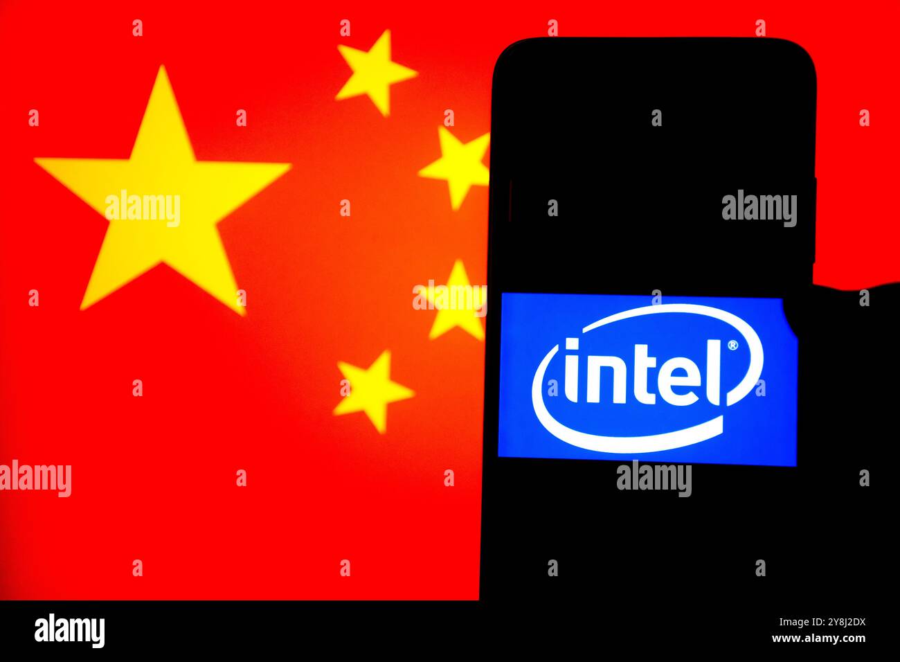 In this photo illustration, an Intel logo seen displayed on a ...
