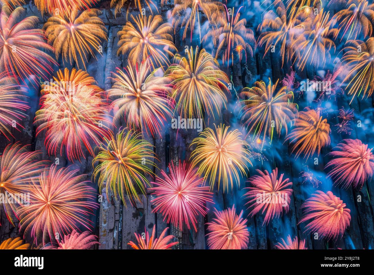 Vibrant fireworks and firecrackers illuminate the night sky during ...